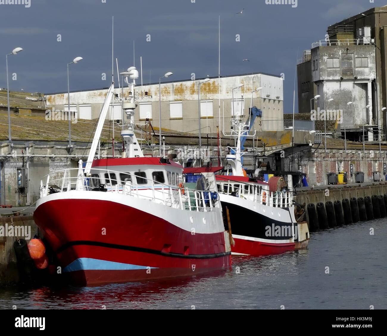 Fishing boat docked at wharf hi-res stock photography and images - Alamy