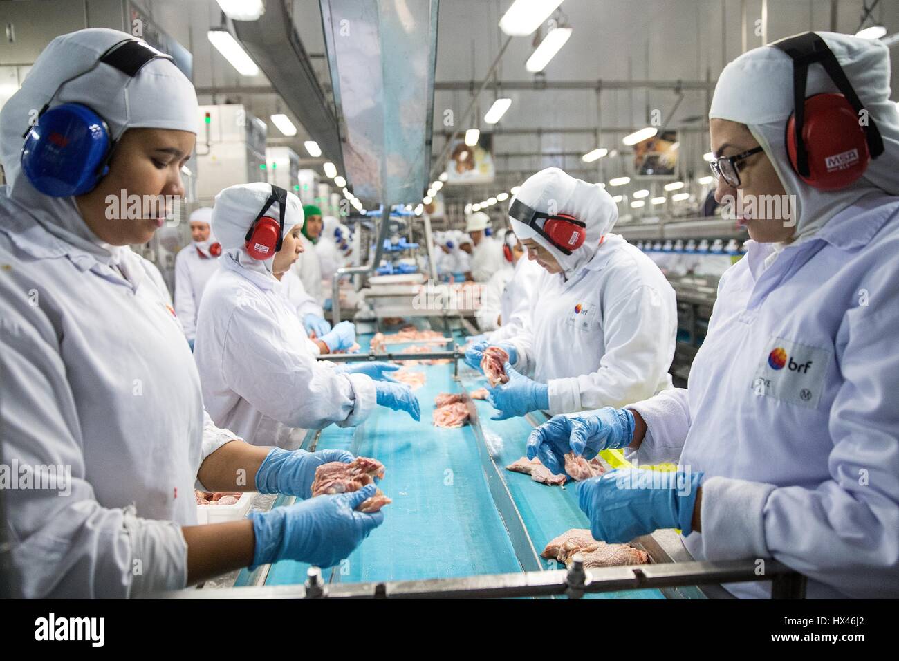 Rio Verde, Goias state. 23rd Mar, 2017. People work inside a plant of ...