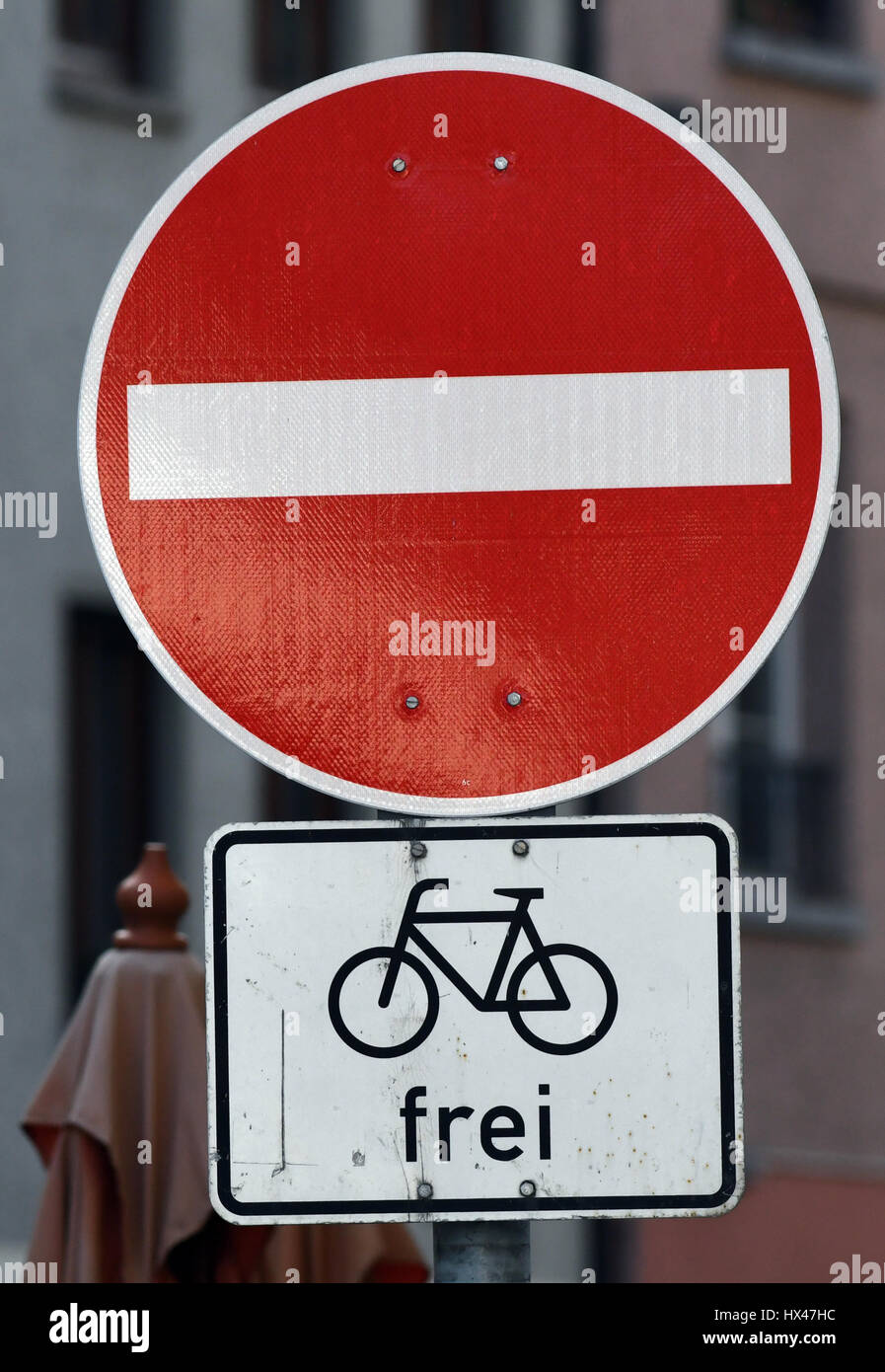 Ulm, Germany. 23rd Mar, 2017. A sign allows cyclists to enter a one-way ...