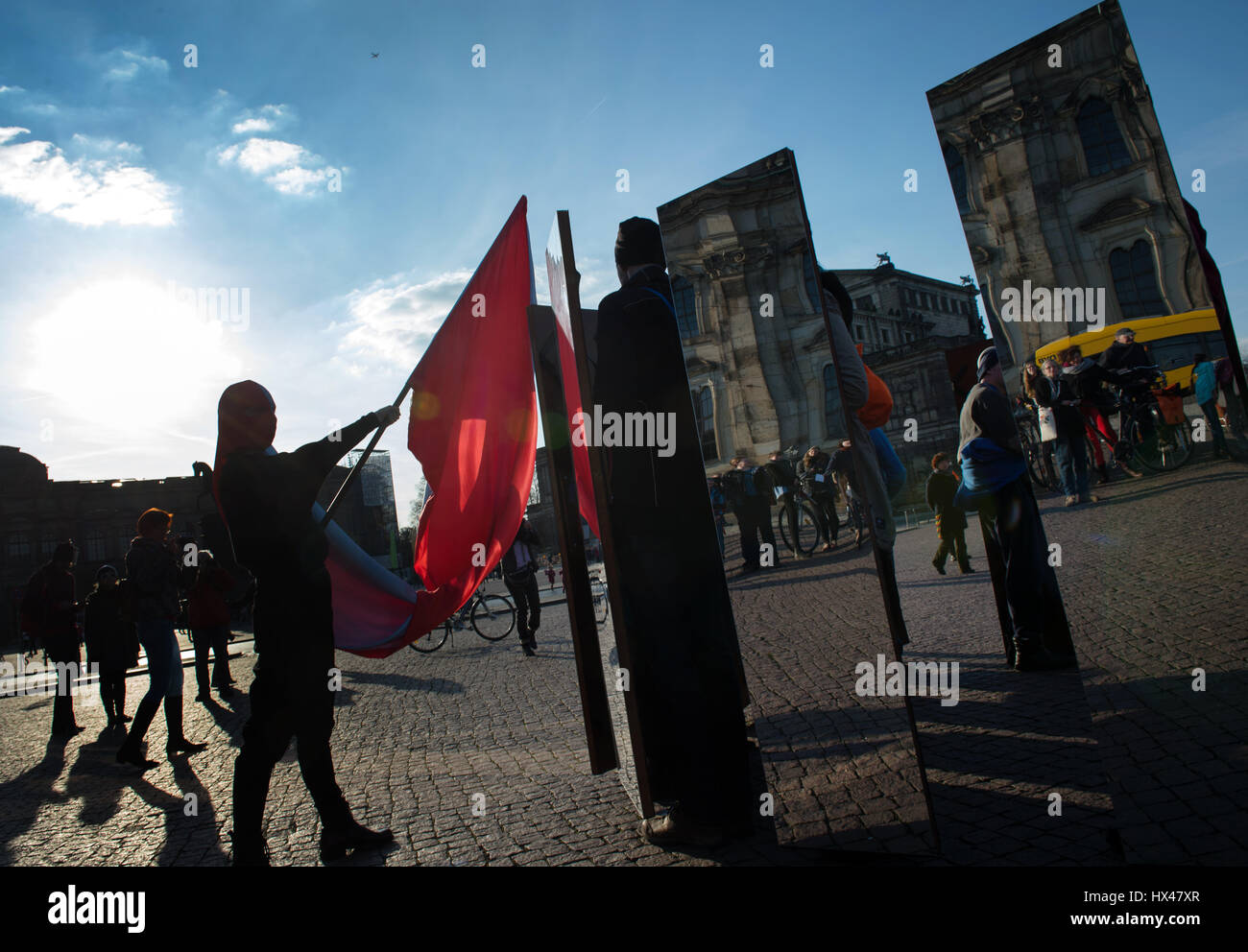 Dresden, Germany. 24th Mar, 2017. Participants of a so-called "Mirror ...