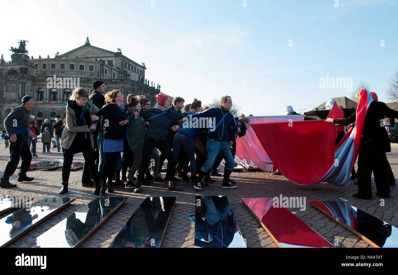 Dresden, Germany. 24th Mar, 2017. Participants of a so-called "Mirror ...