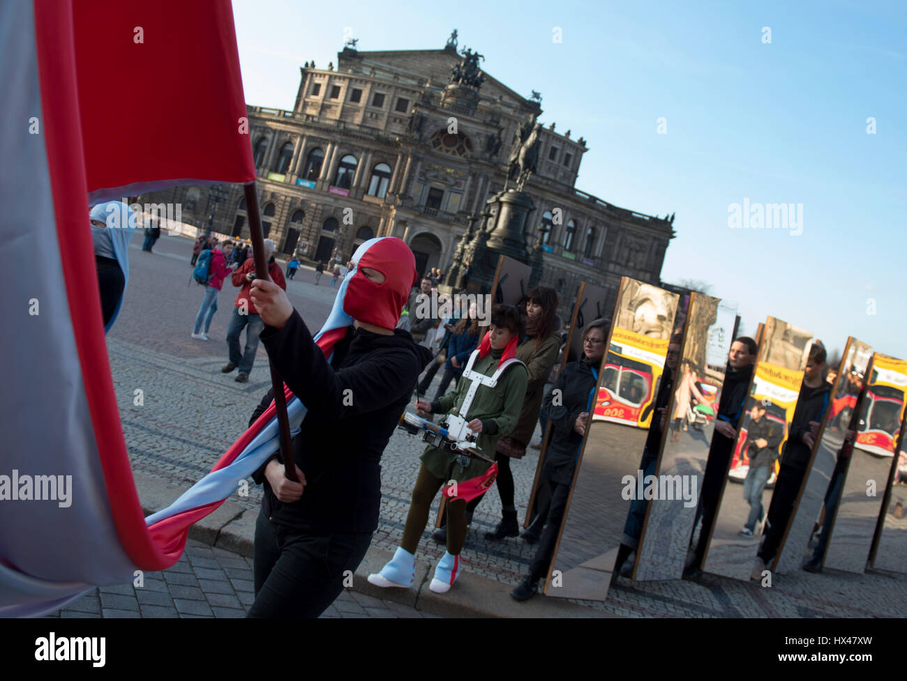 Dresden, Germany. 24th Mar, 2017. Participants of a so-called "Mirror ...