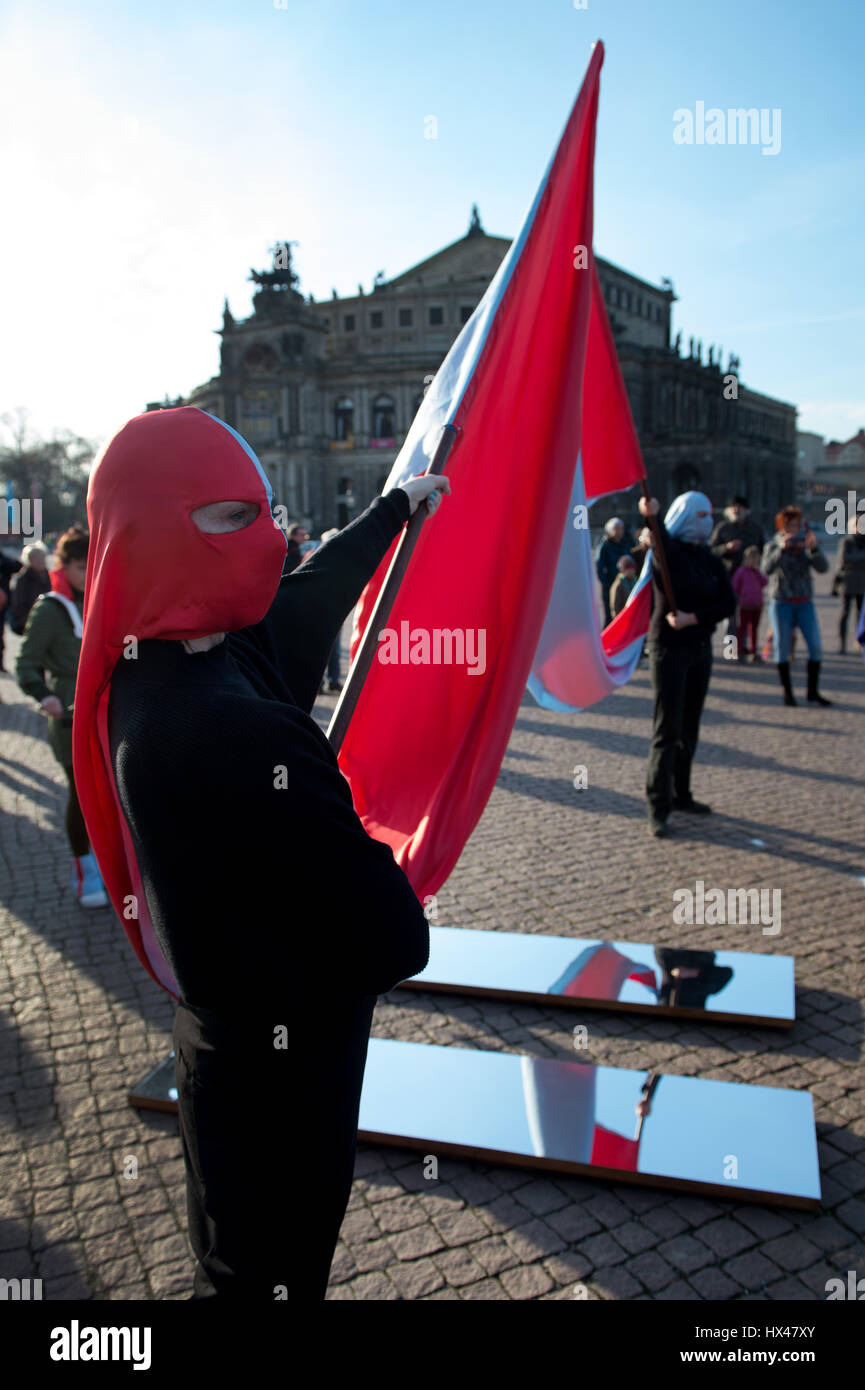 Dresden, Germany. 24th Mar, 2017. Participants of a so-called "Mirror ...