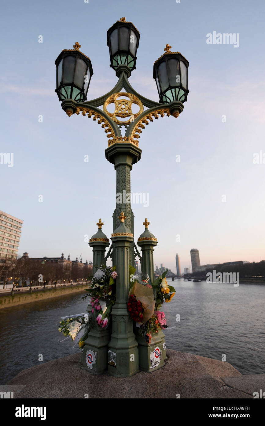 London, UK. 24 March 2017. Every lamp post on Westminster Bridge ...
