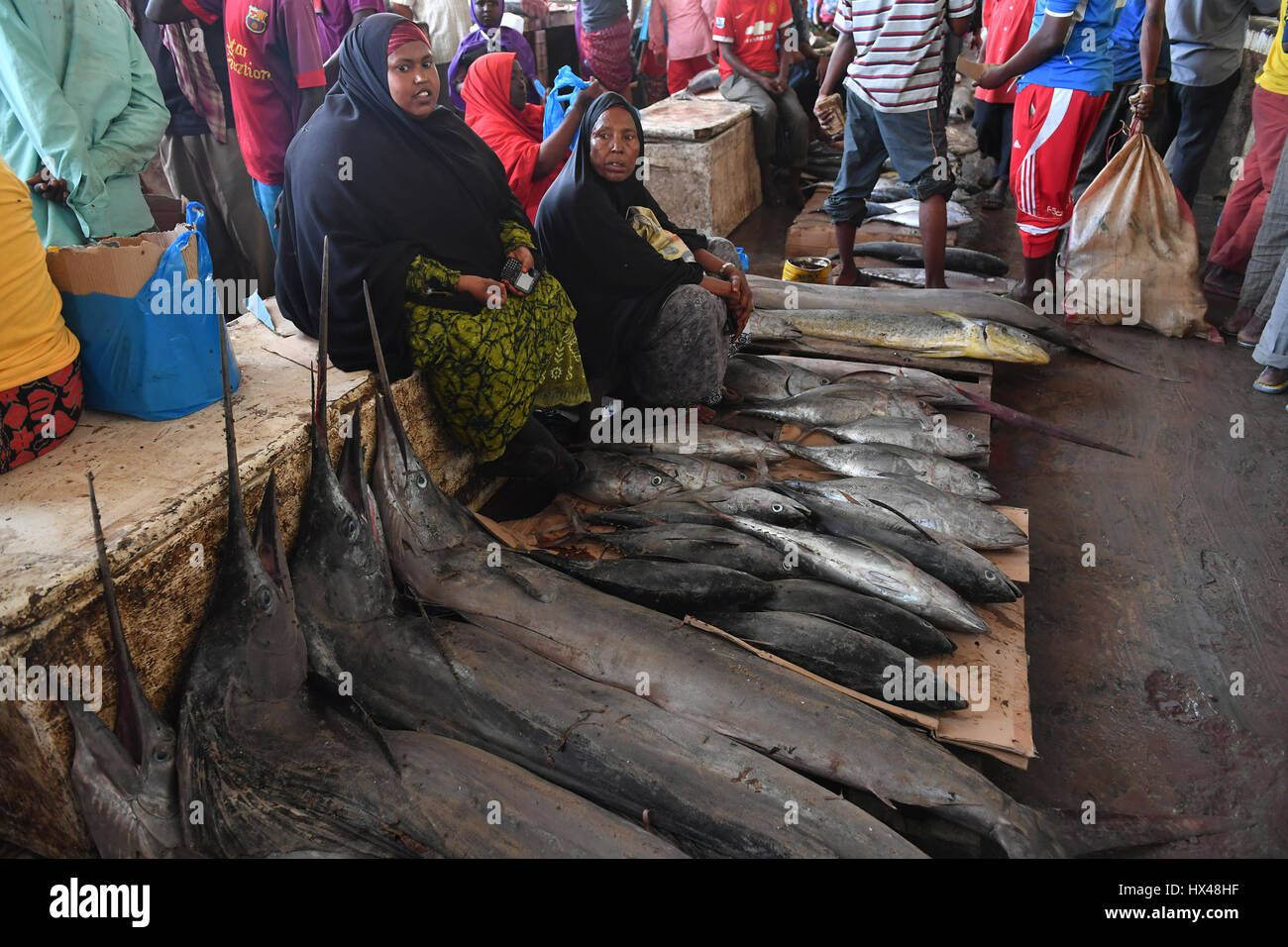 Mogadishu, Somalia. 23rd Mar, 2017. Traders wait for customers at a ...