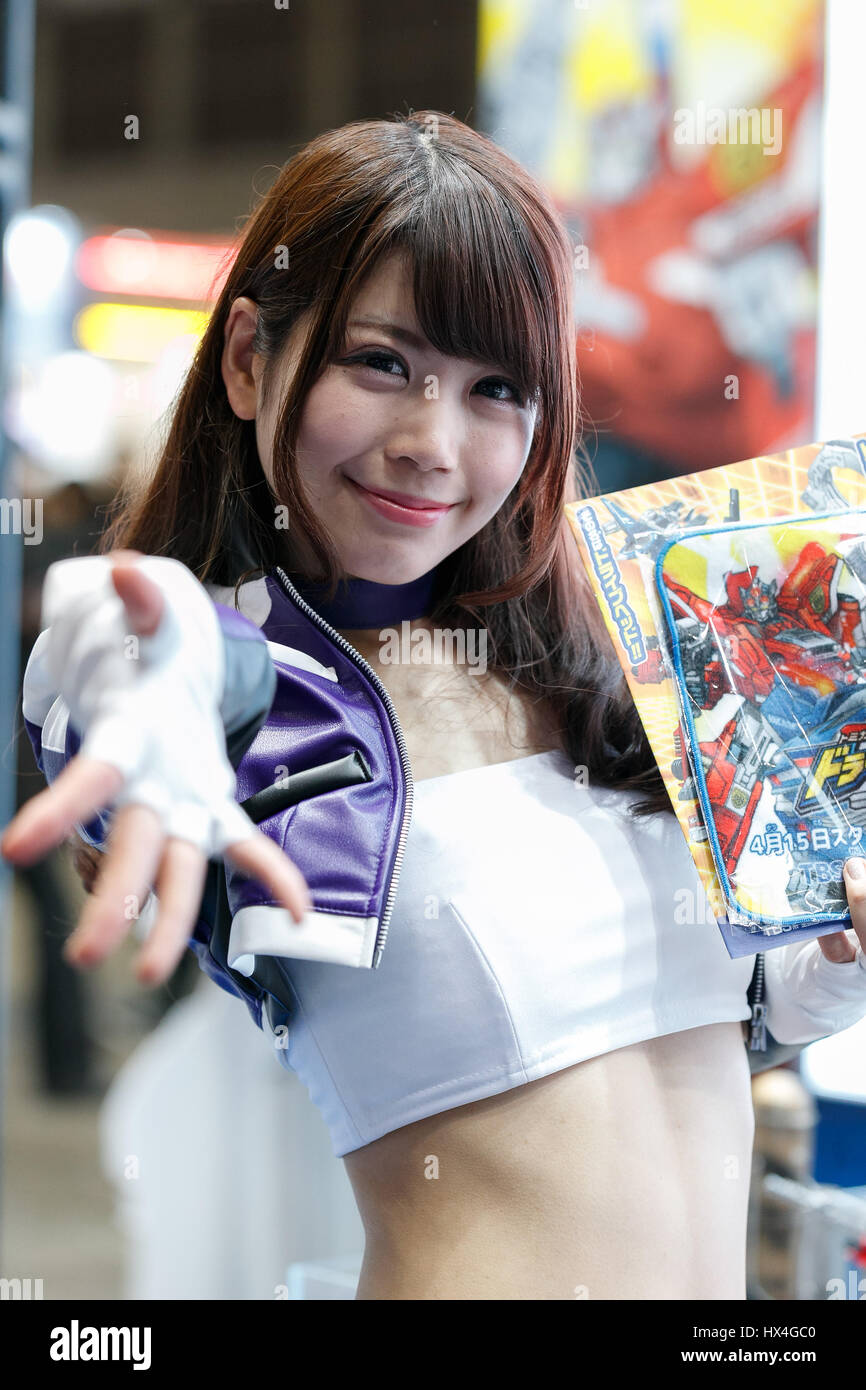 A booth assistant poses for a photograph during the AnimeJapan 2017 at ...