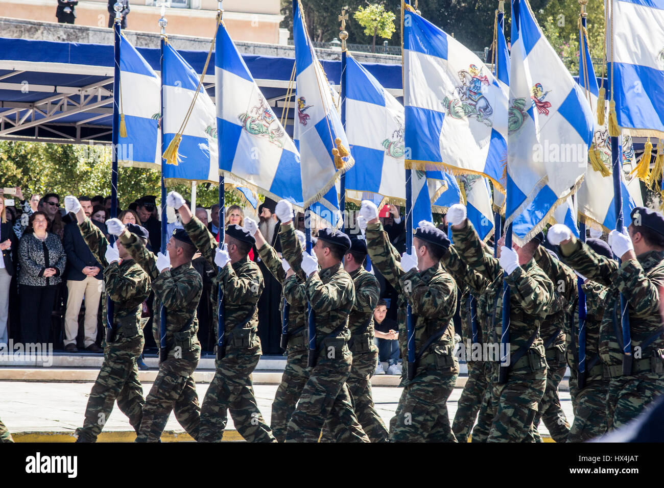 Athens, Greece. 25th Mar, 2017. The military flags pass in front of the ...