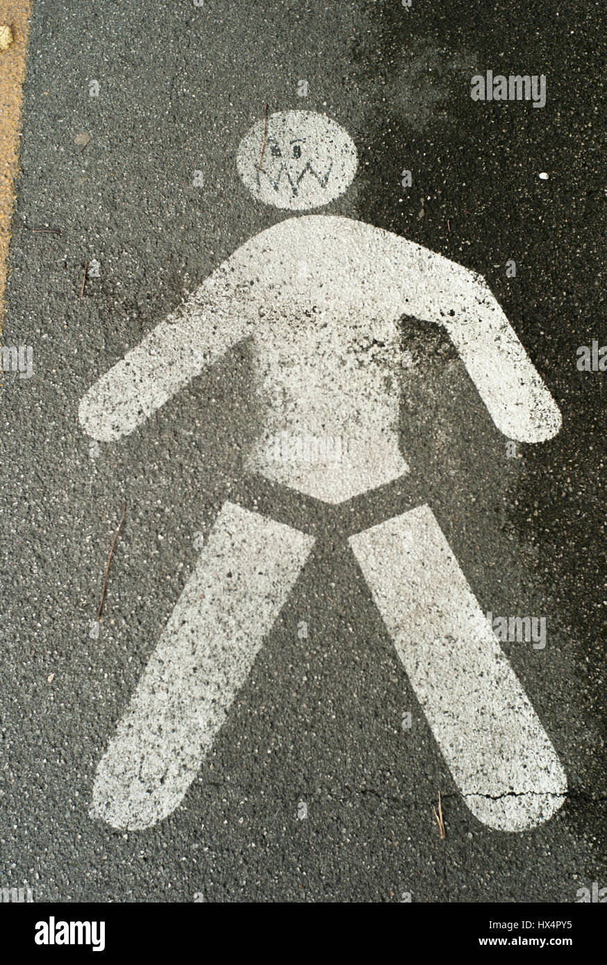 Pedestrian sign on asphalt Stock Photo - Alamy