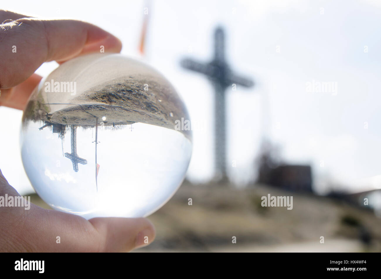 Millennium cross on Vodno through crystal ball Stock Photo - Alamy
