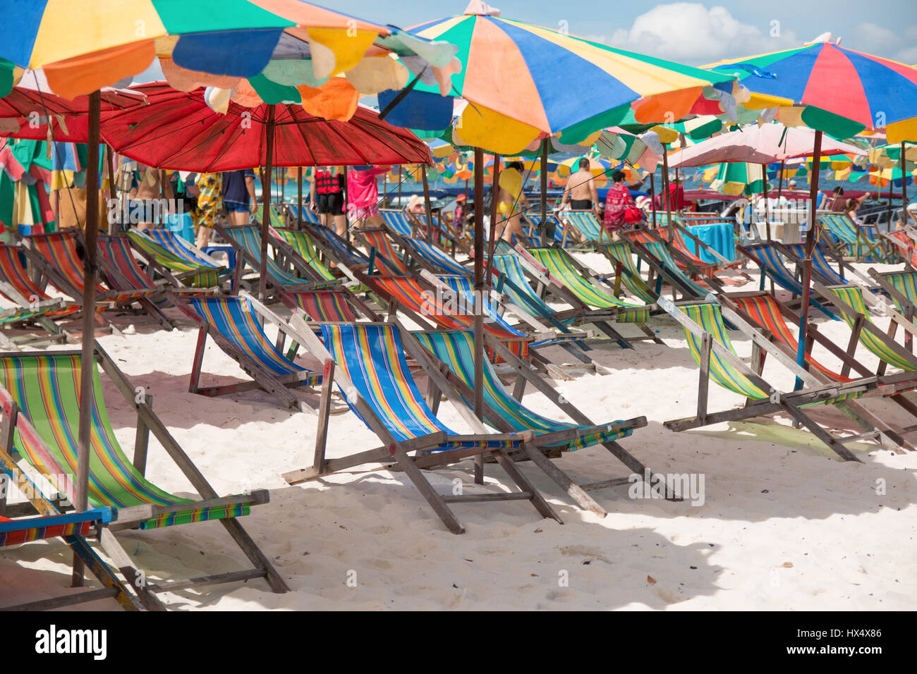 Colorful Beach chairs and with umbrella on the beach Stock Photo - Alamy