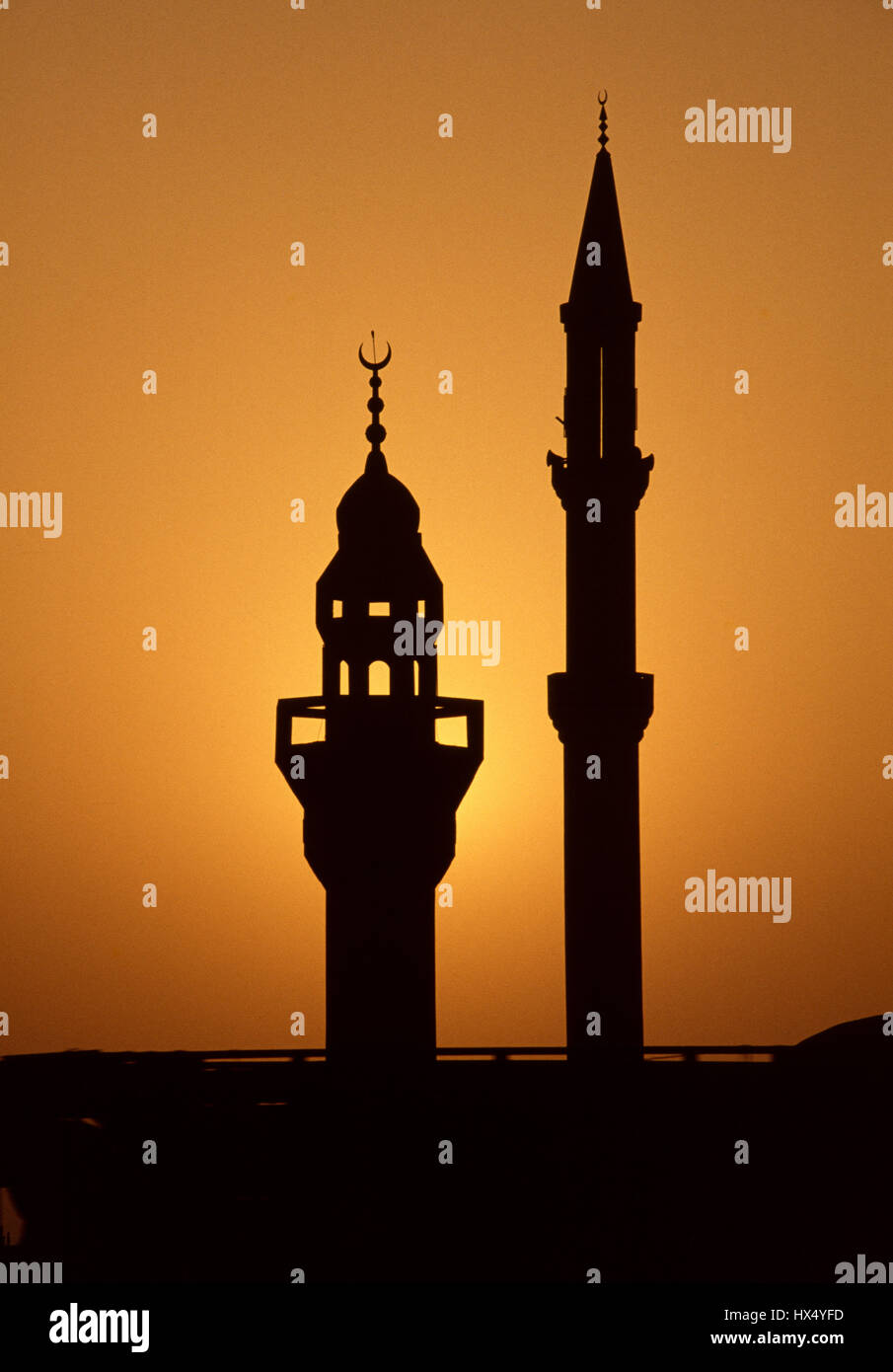 jeddah, saudi arabia -- a pair of minarets at sunset Stock Photo - Alamy