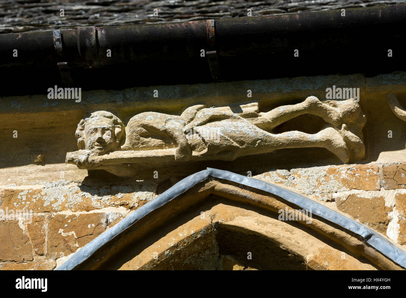 Stone carving on St. Peter`s Church, Hanwell, Oxfordshire, England, UK ...