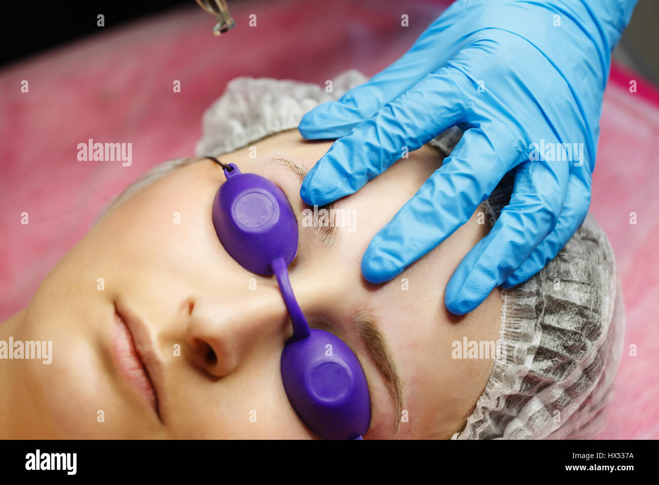 Laser removal of tattoo eyebrows. Shooting closeups. Cosmetic medical ...