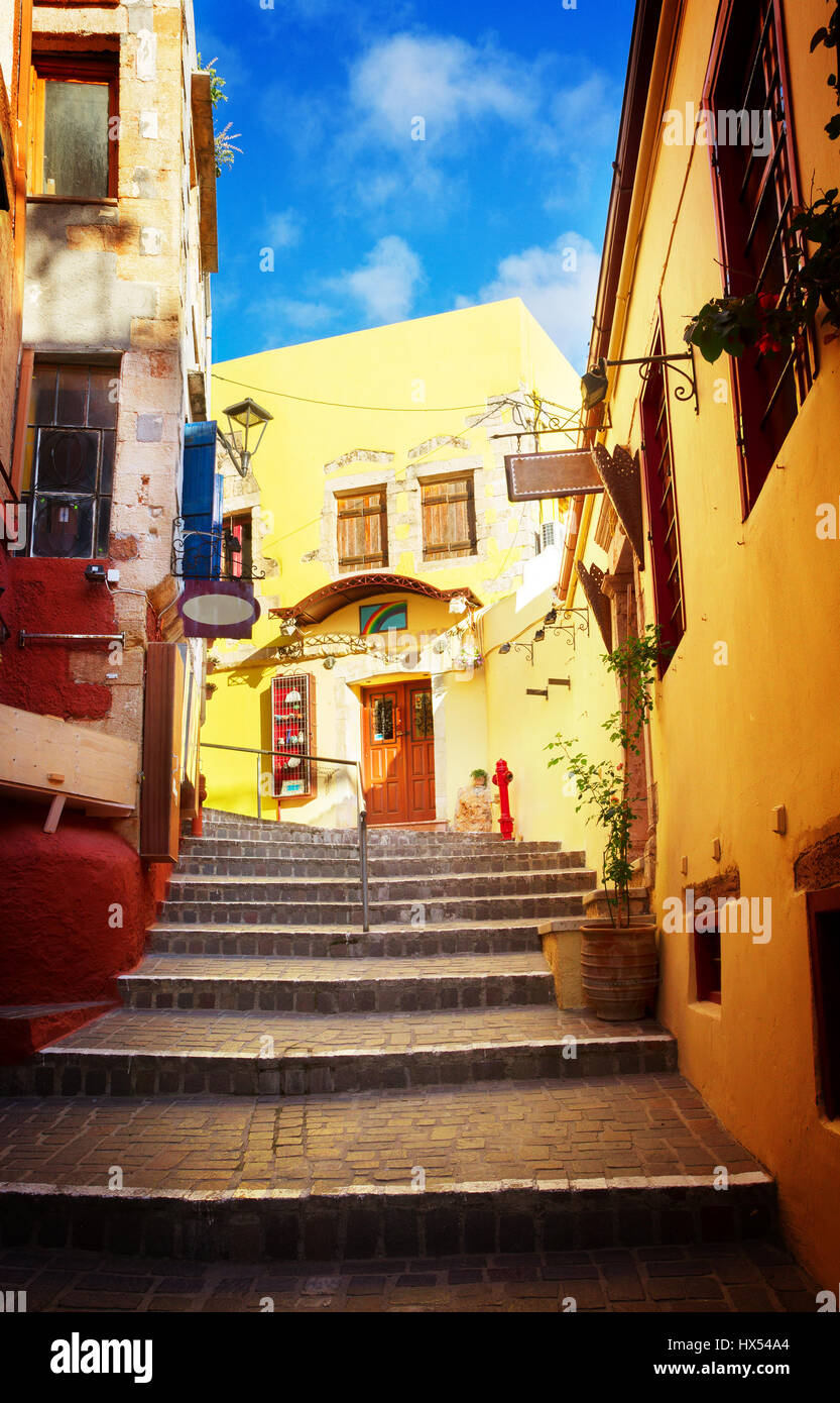 cosy street of Chania old town with stairs, Crete, Greece, retro toned ...