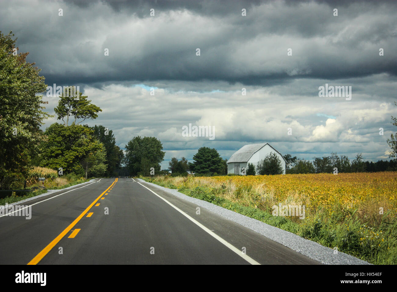 Highway going through fields hi-res stock photography and images - Alamy