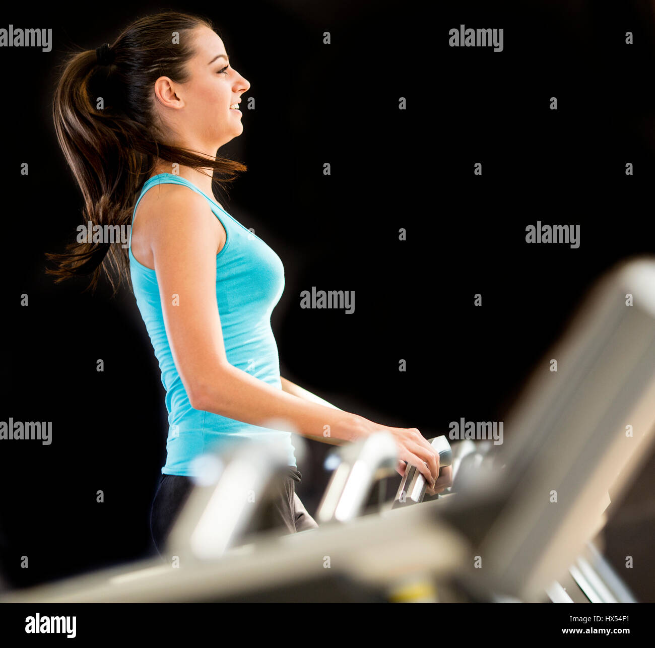 Young woman exercise on the treadmill at the gym Stock Photo - Alamy