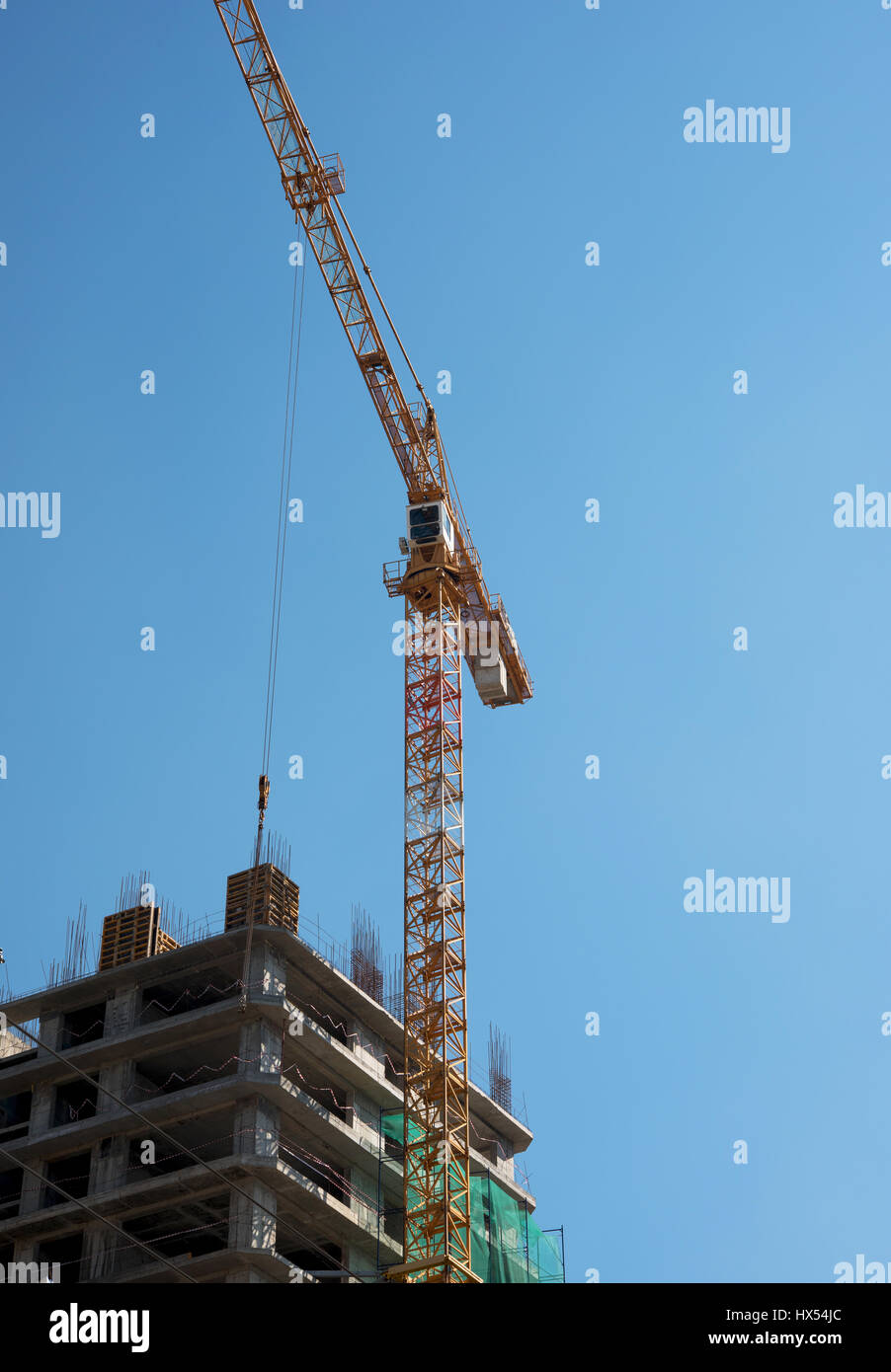 tower crane building a house Stock Photo - Alamy