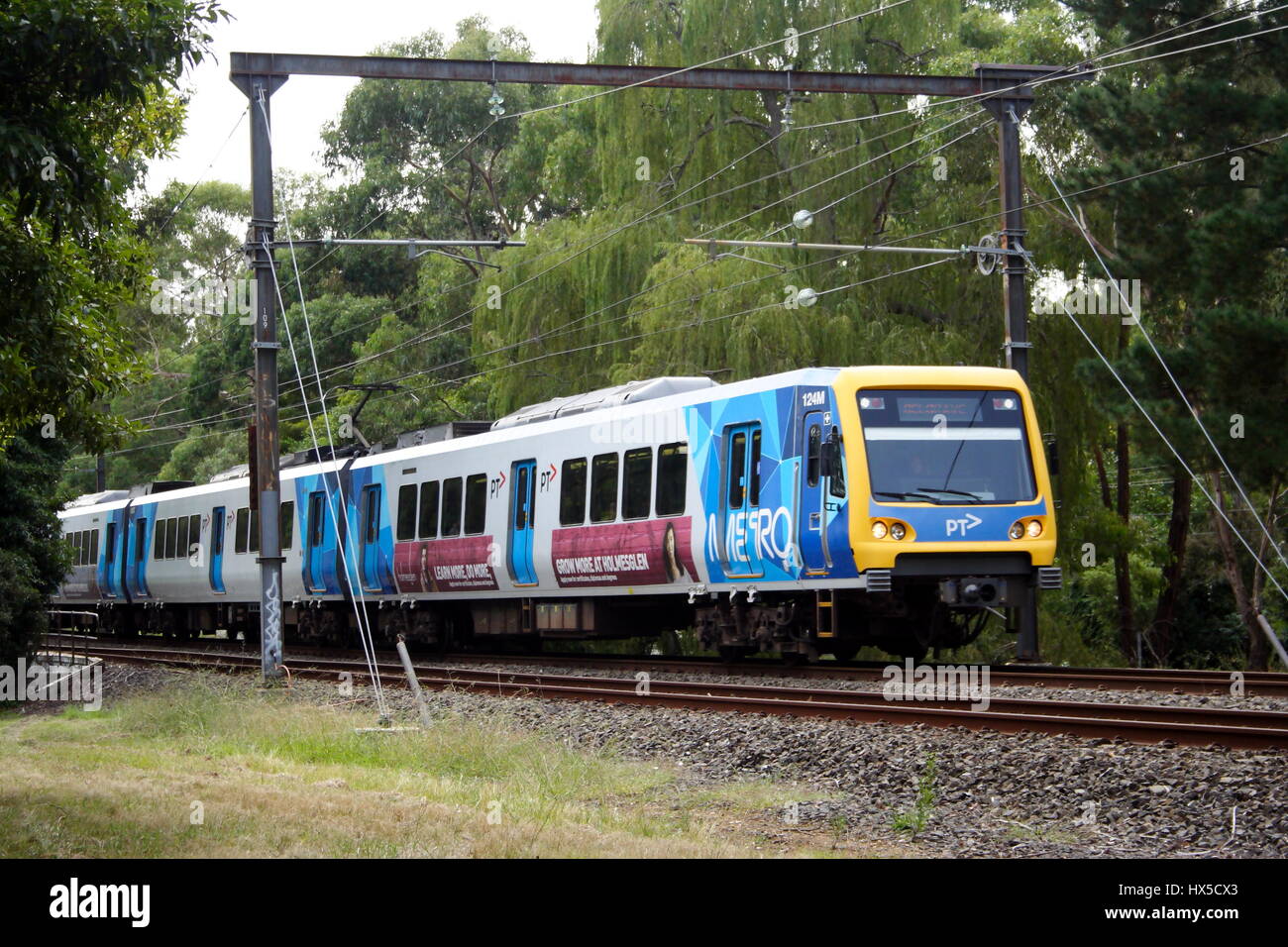Melbourne metro train travelling between Boronia and Ferntree Gully ...