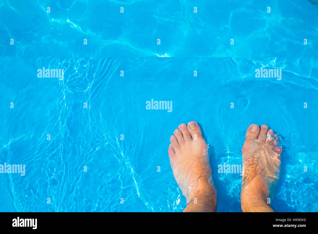 Human feet and swimming pool hi-res stock photography and images - Alamy