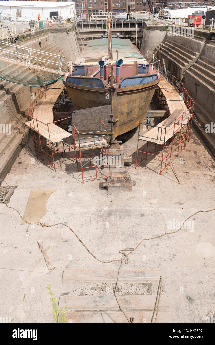 Work in progress on repairing and restoring unpowered barge Sabrina 5 ...