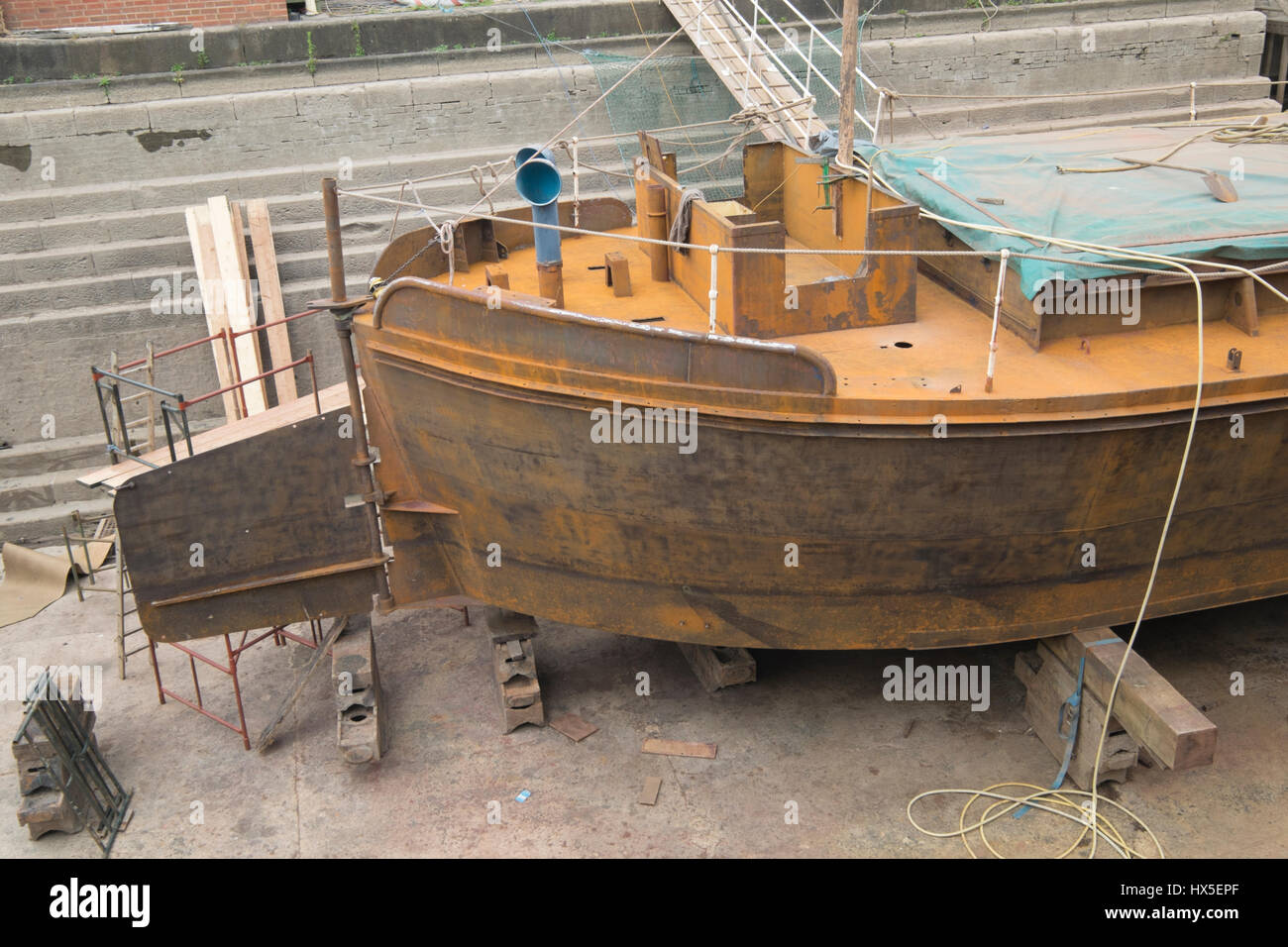 Work in progress on repairing and restoring unpowered barge Sabrina 5 ...