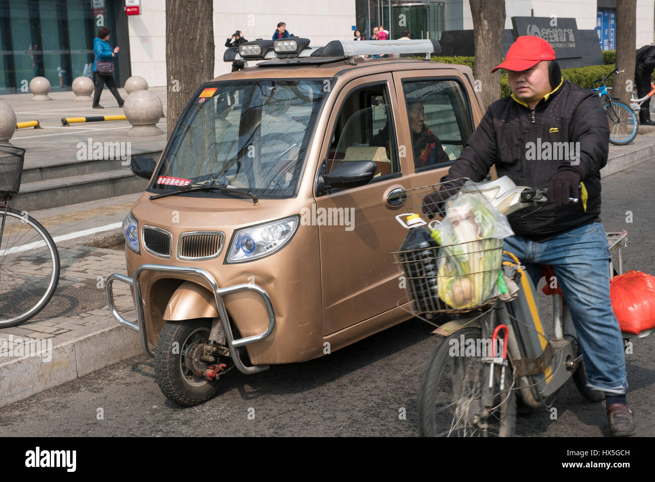 Unlicensed mini electric car in Beijing, China. 27-Mar-2017 Stock Photo ...