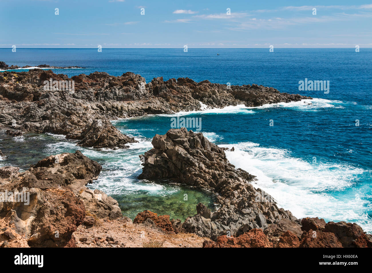 Rocky Atlantic coastline at the Faro de Punta Rasca in Tenerife, Spain ...