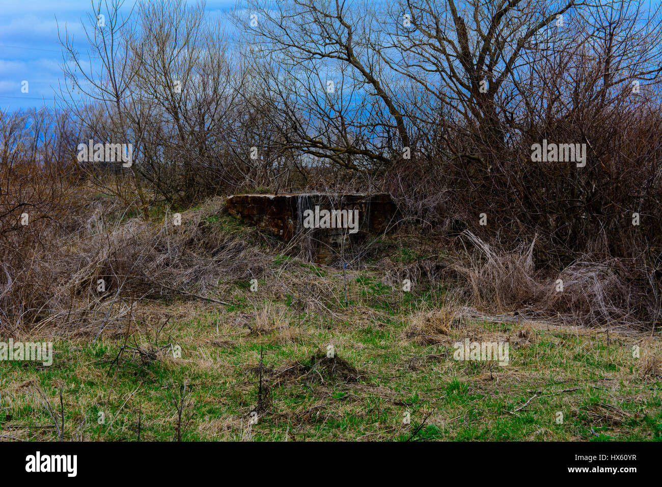 Old and unnecessary ruined farm buildings abandoned in the field Stock ...