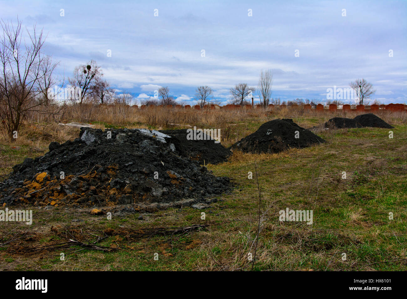 Pile of pulp in the field. Waste from the processing of granite in the ...