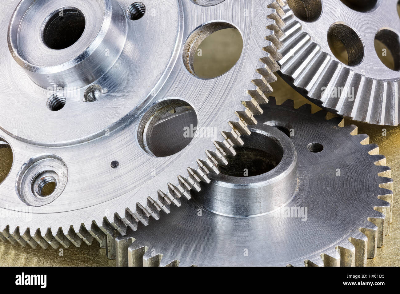grey metal gear cogwheels on scratched industrial background macro view ...