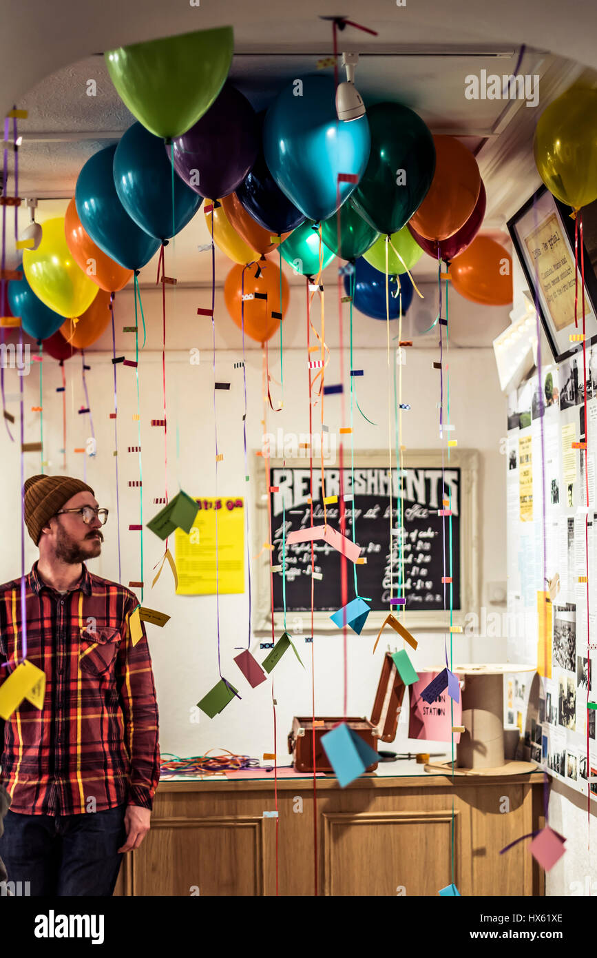 Balloons floating man hi-res stock photography and images - Alamy