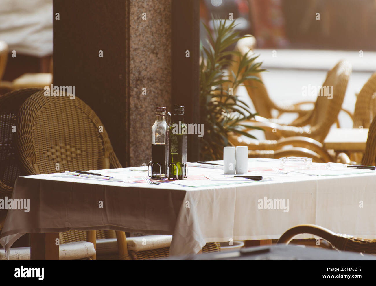 Mediterranean restaurant terrace exterior with chairs Stock Photo - Alamy