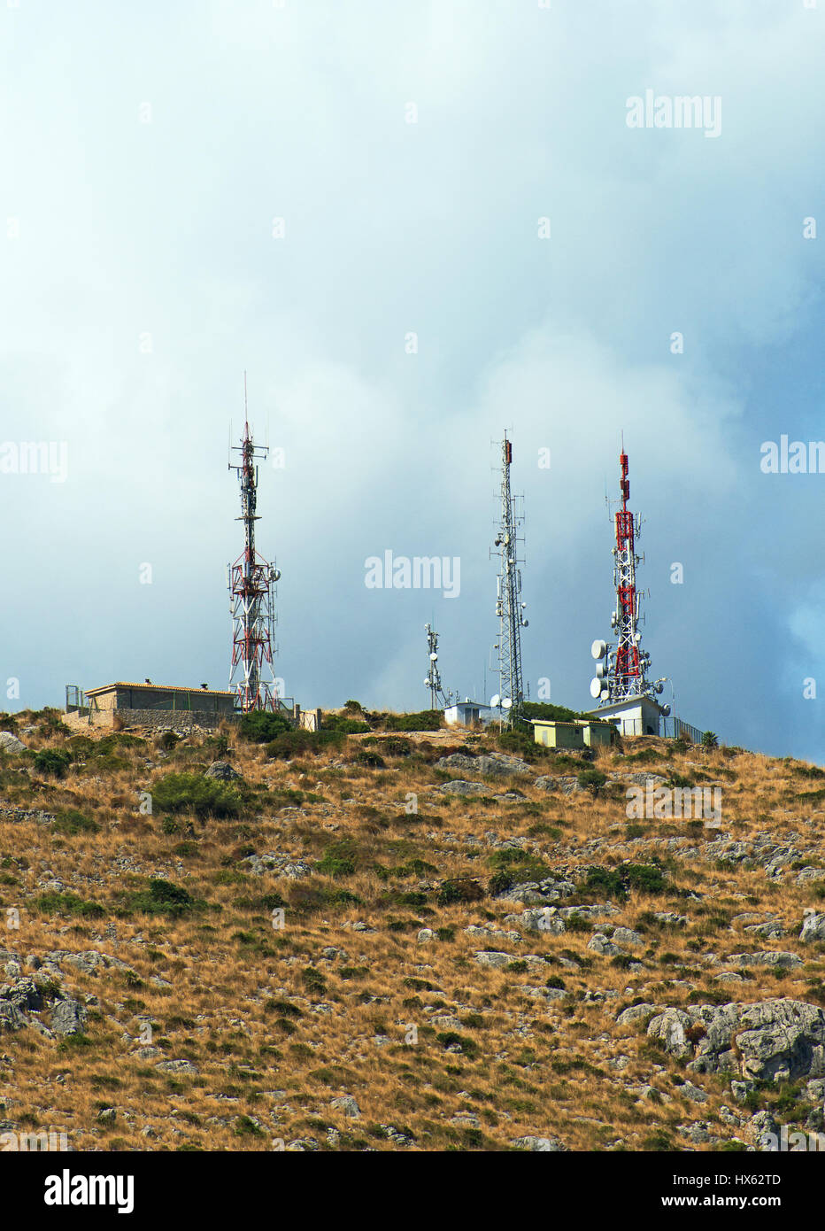Telecommunication towers with antennas on the hill Stock Photo - Alamy