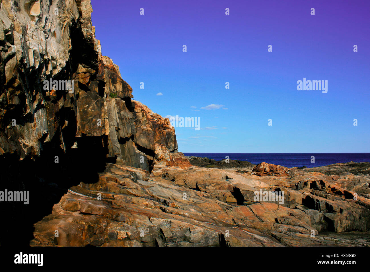 Sone cliffs of the rocky shoreline at Acadia National Park near Bar ...