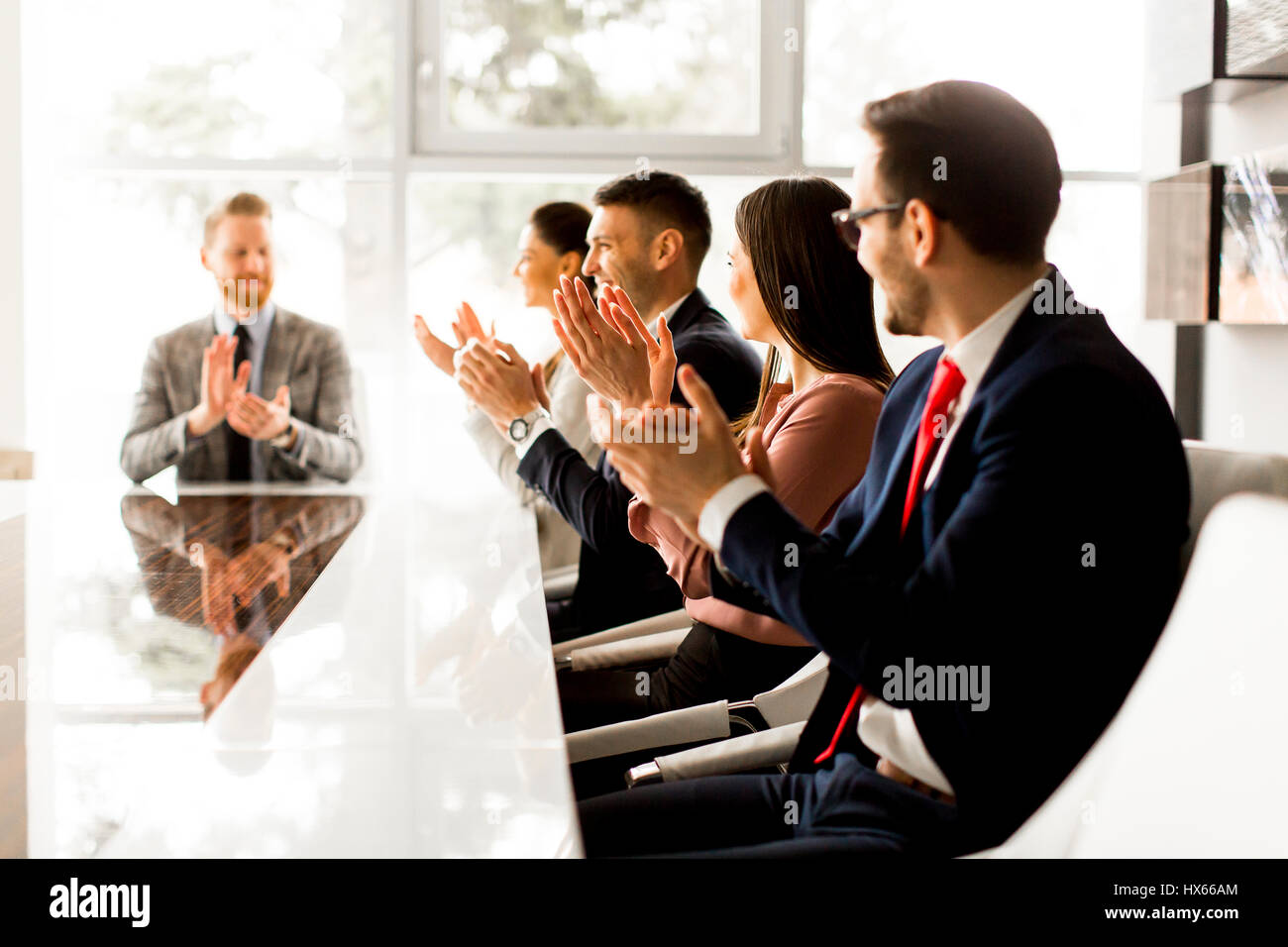 Businessmen clapping hands hi-res stock photography and images - Alamy