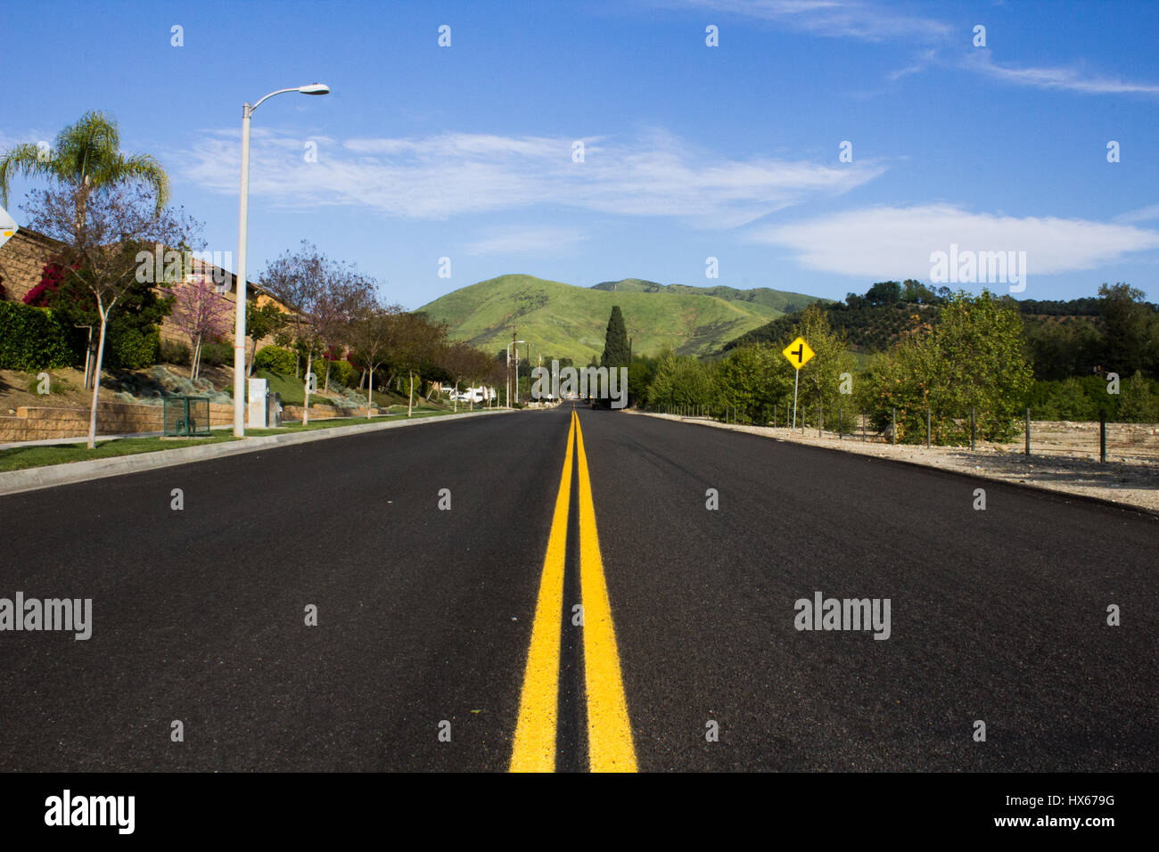Two lane road with cars neighborhood hi-res stock photography and ...