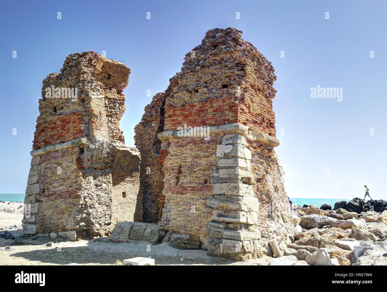 The ruins of Torre Flavia, an ancient roman tower on the beach of ...