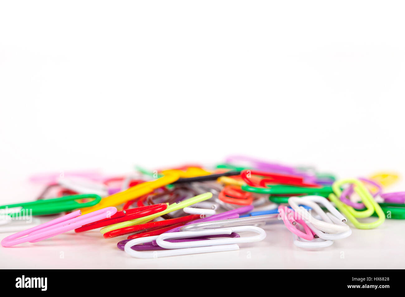 Pile of colorful paper clips isolated on white background Stock Photo ...