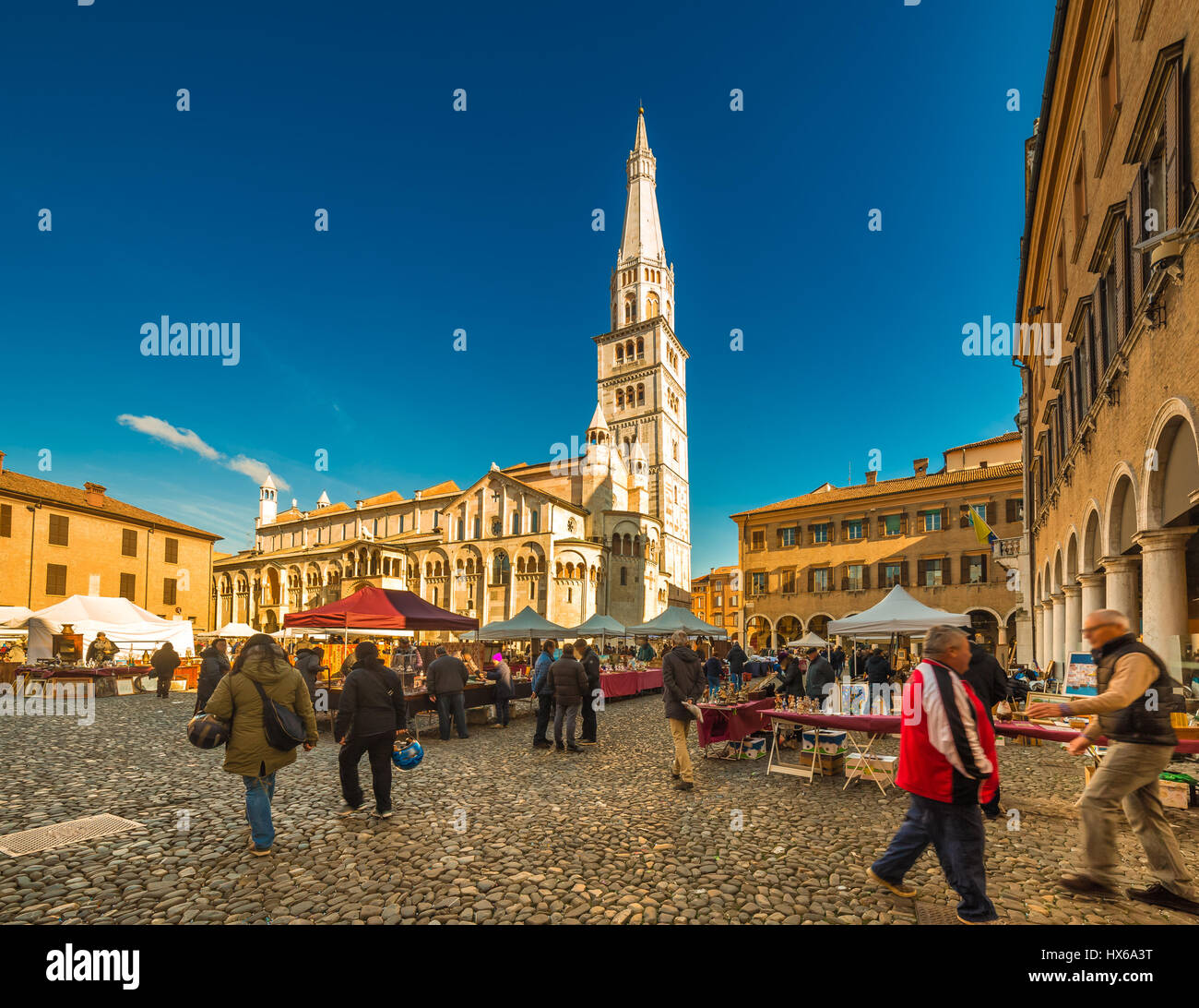 stalls of antique market in the main square of Modena in Italy Stock ...