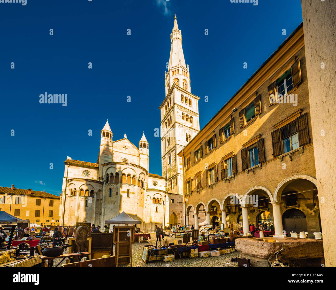 stalls of antique market in the main square of Modena in Italy Stock ...