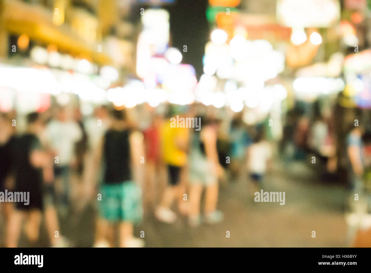 Blurred image of busy night life in the city Stock Photo - Alamy