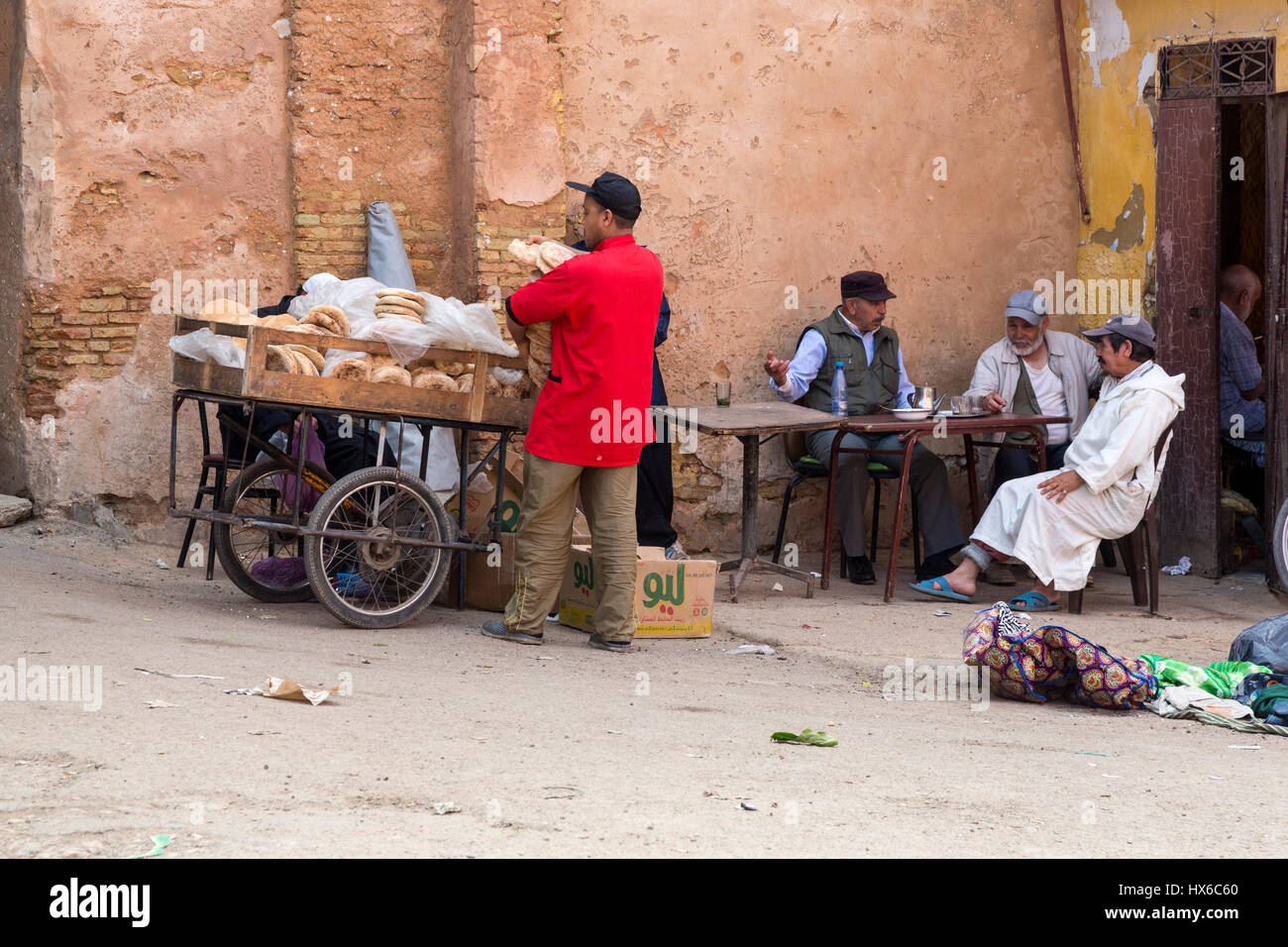 Meknes, Morocco. Bab Jdid, Bread Vendor, Men Talking over Tea Stock ...