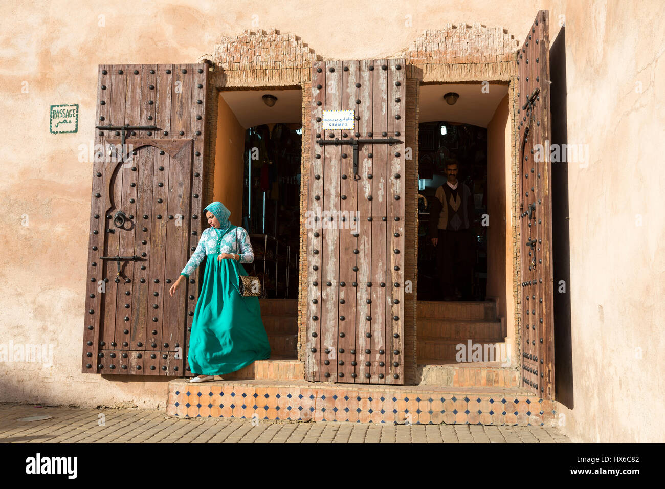 Meknes, Morocco. Woman Exiting a Shopping Area Stock Photo - Alamy