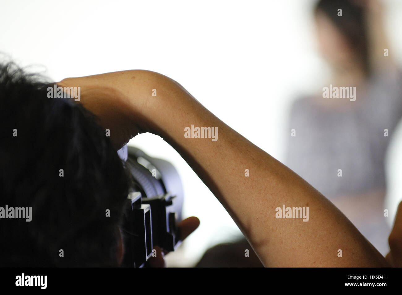 photographer shooting a model Stock Photo - Alamy