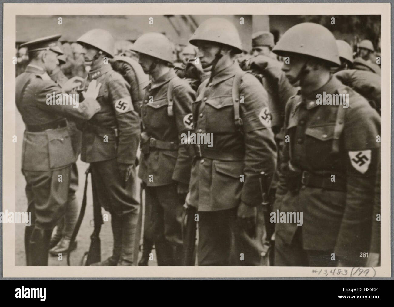 This historical image shows Slovakian soldiers being decorated by ...