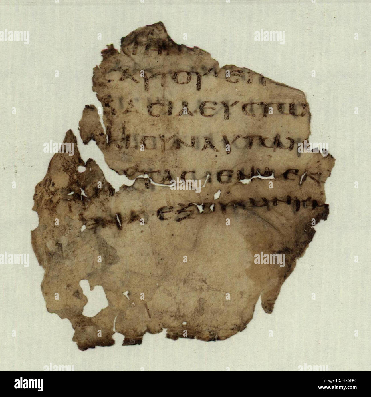 Uncial 0215, a manuscript fragment, contains a passage from Mark 15:26 ...