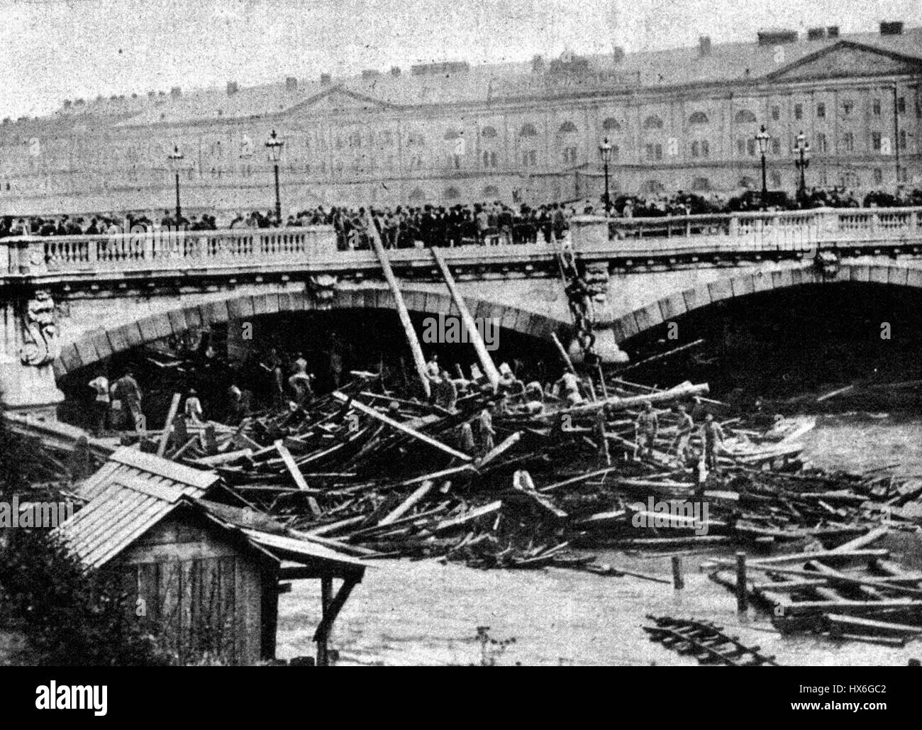 This 1897 photograph captures the flooding at Schwarzenbergbrücke, a ...