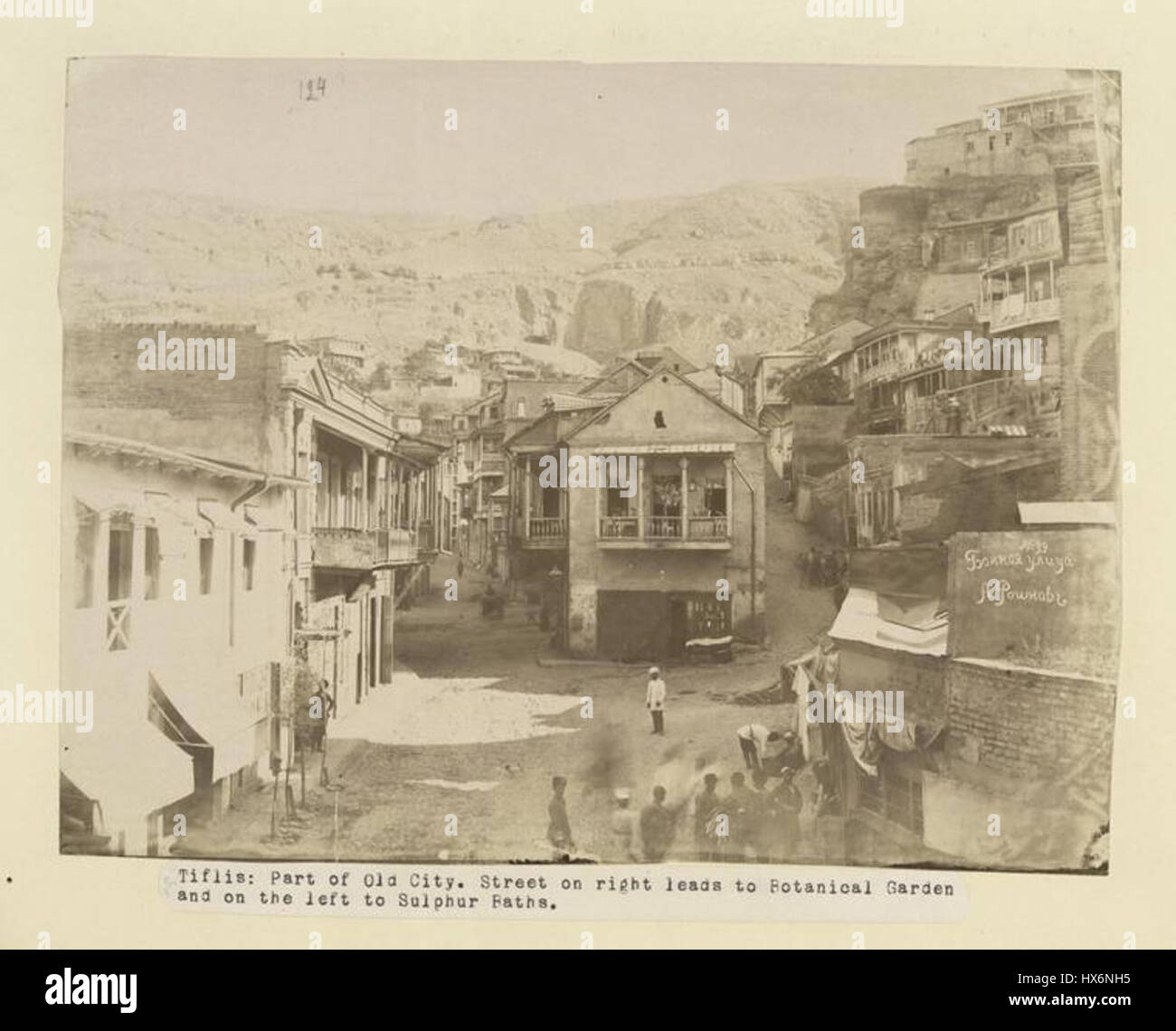 This description outlines a street in an old city, where one path leads ...
