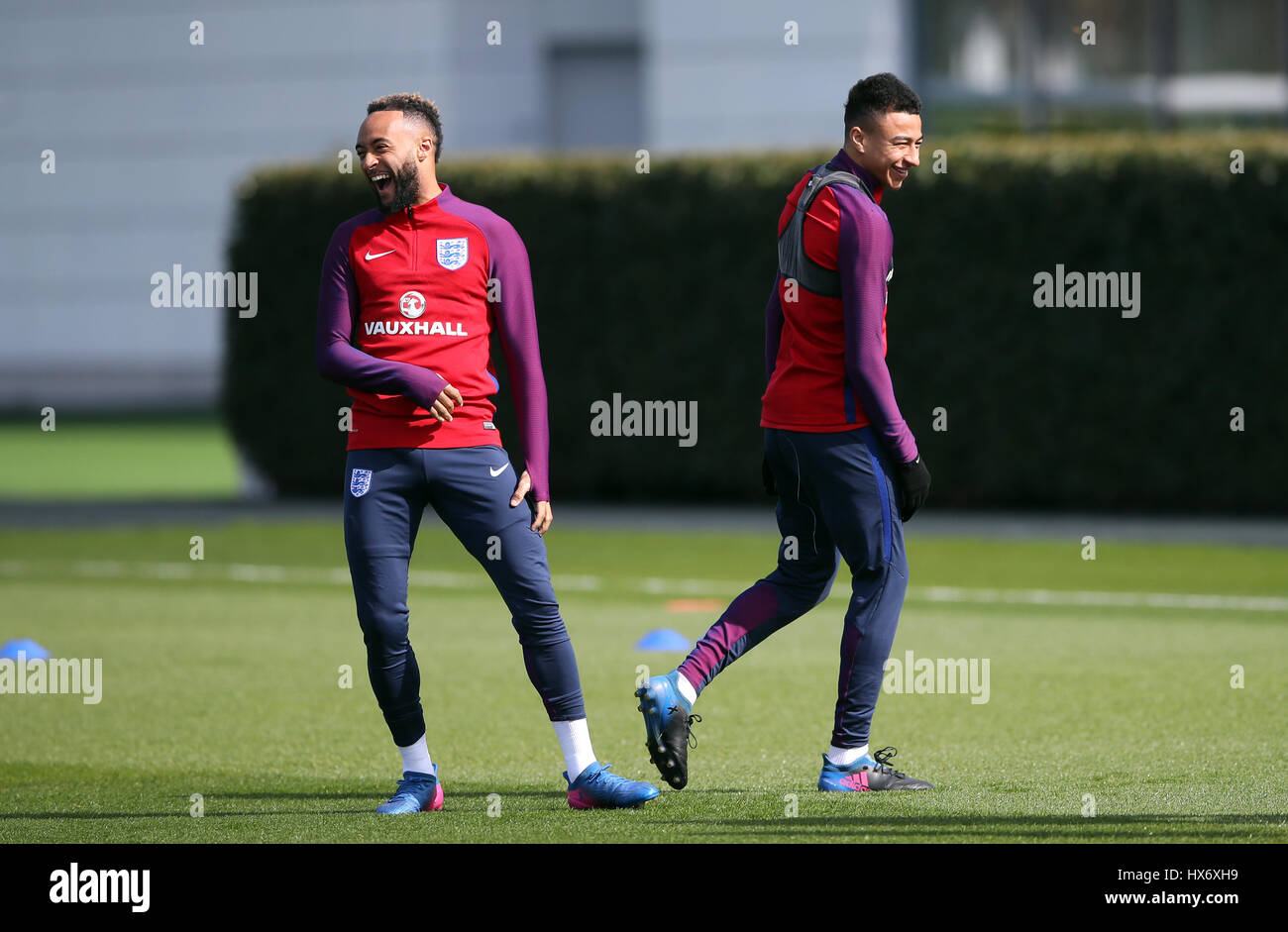 England's Nathan Redmond (left) shares a joke with Jesse Lingard during ...