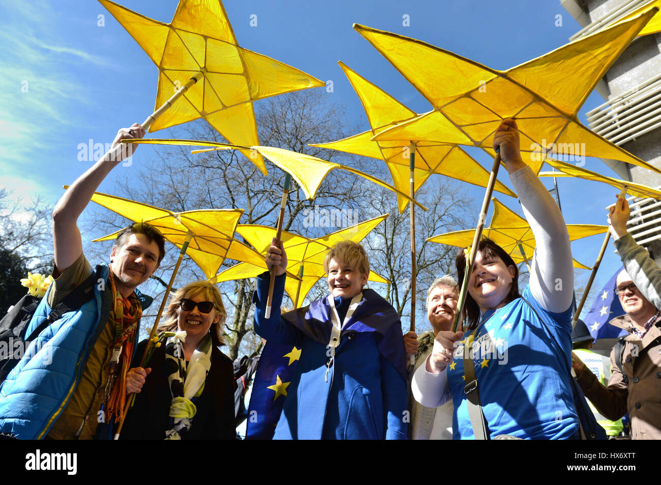 Stars symbolising the European Union are held by pro-EU protesters ...